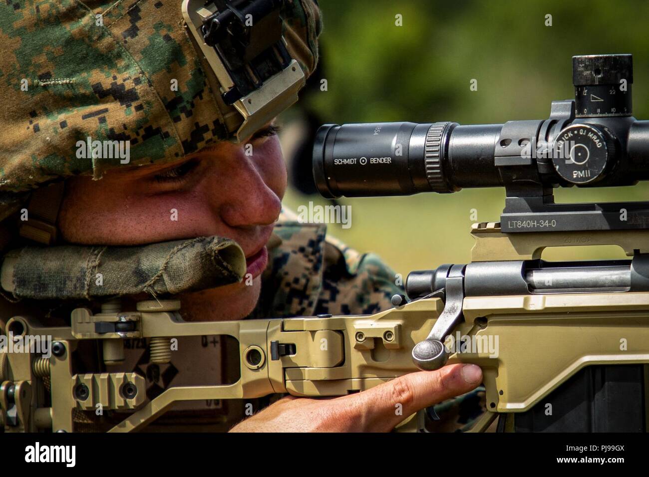 A U.S. Marine with Black Sea Rotational Force 18.1 sights in on a ...