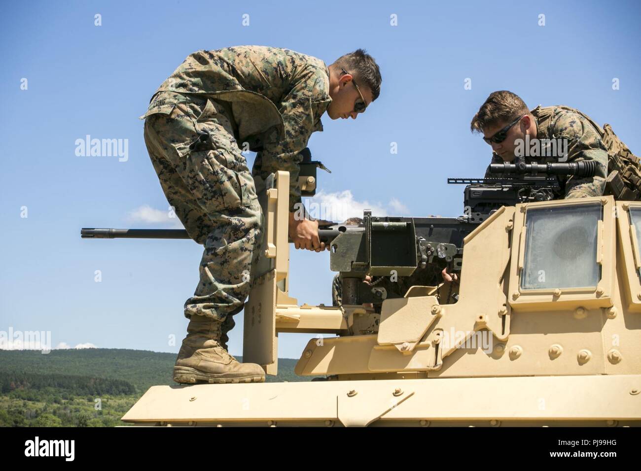 U.S. Marines with Black Sea Rotational Force 18.1 mount an M2A1 .50 ...