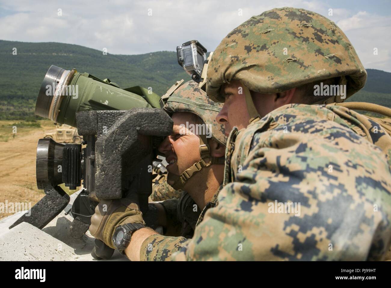 U.S. Marines with Black Sea Rotational Force 18.1 lock onto a target ...