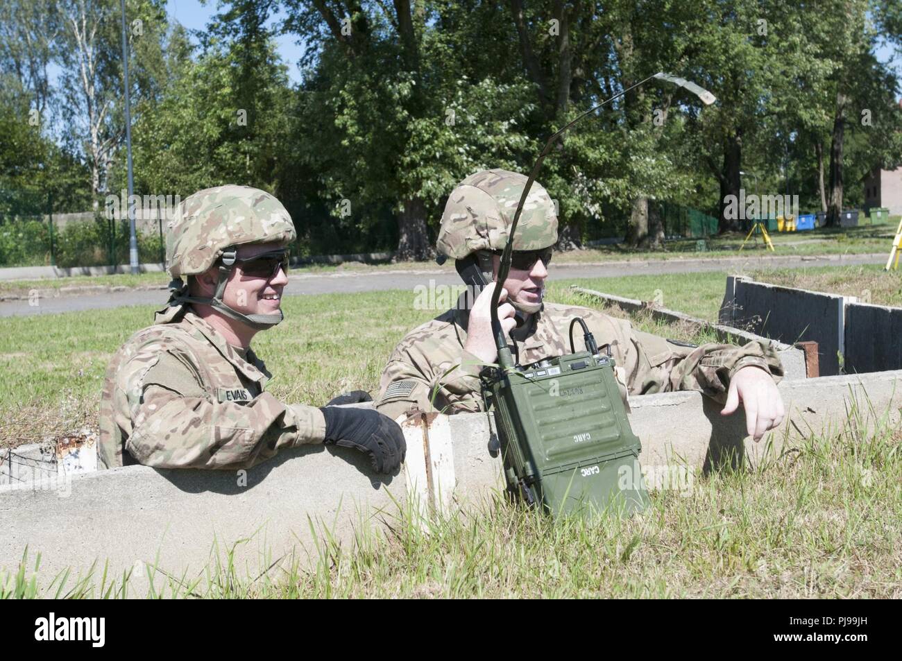 U.S. Army Spc. Jeffery Evans and Pfc. John Collins, both assigned to Company B, 151st ...
