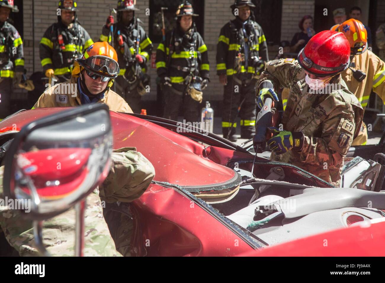 Firefighters with the New York City Fire Department (FDNY) train ...