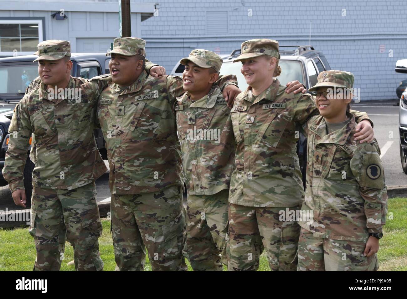 Members of the 111th Army Band gather together to watch the performance ...