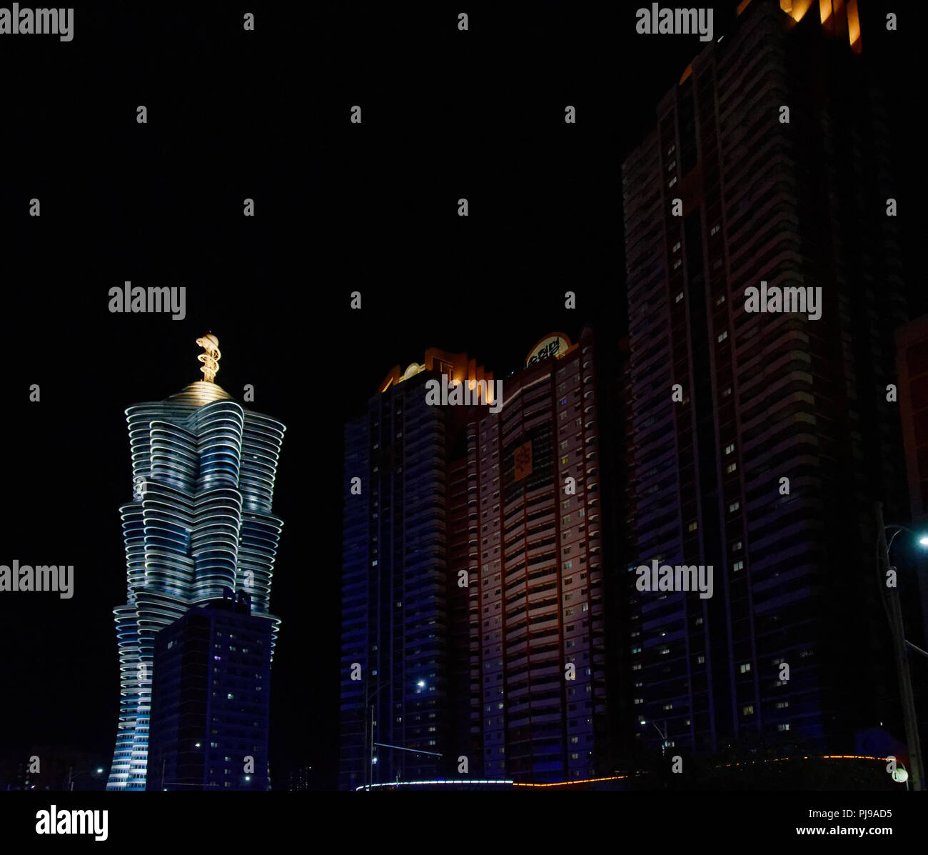 The Unha Tower. Mirae Scientists Street, Pyongyang North Korea, lit up ...