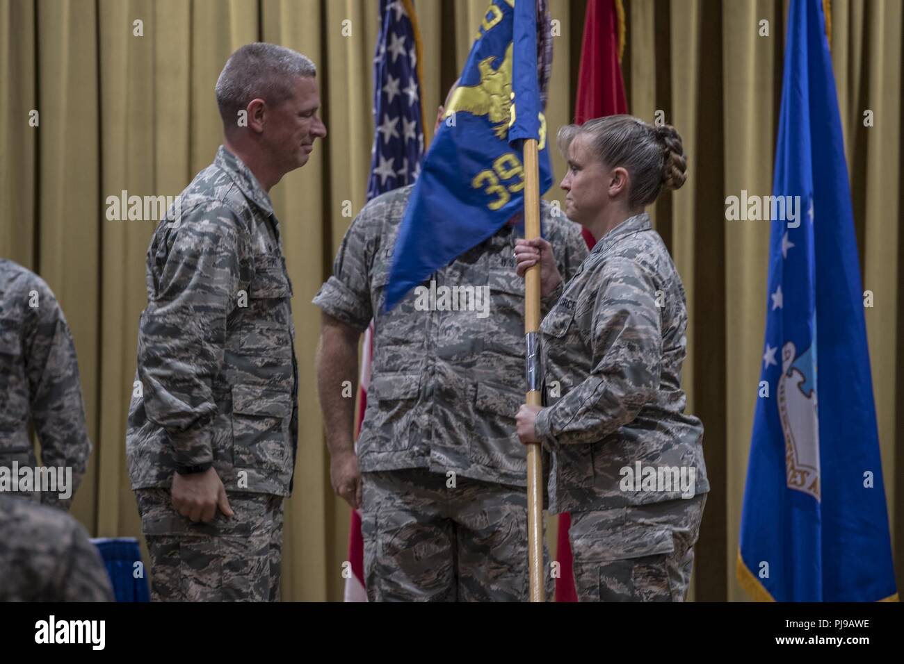 U.S. Air Force Col. Britt Hurst, 39th Air Base Wing commander, passes ...
