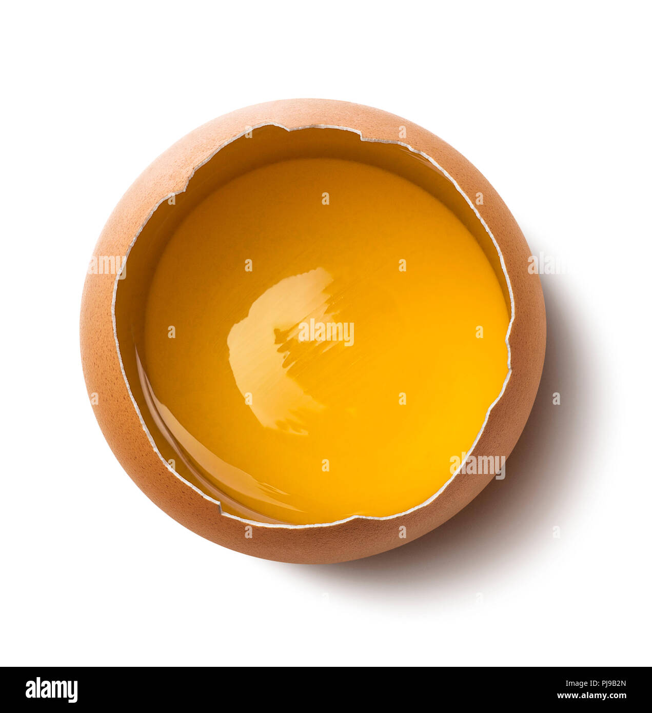 Single fresh egg yolk on white background as package design element ...