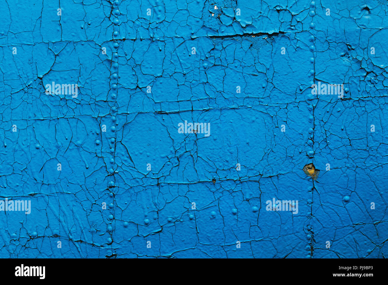 Surface texture with a cracked blue paint Stock Photo - Alamy