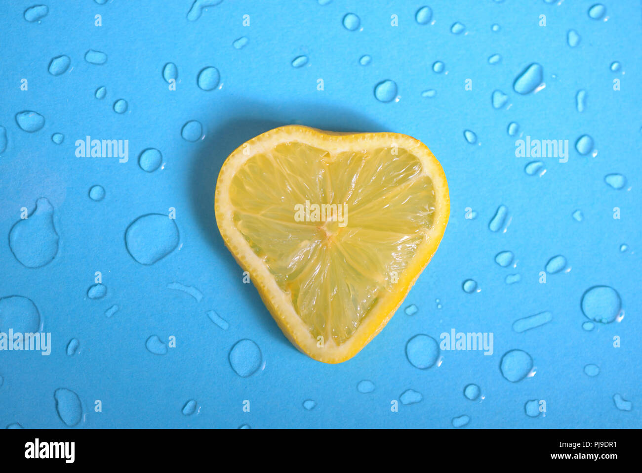 Heart shape of Lemon slice and drops Stock Photo - Alamy