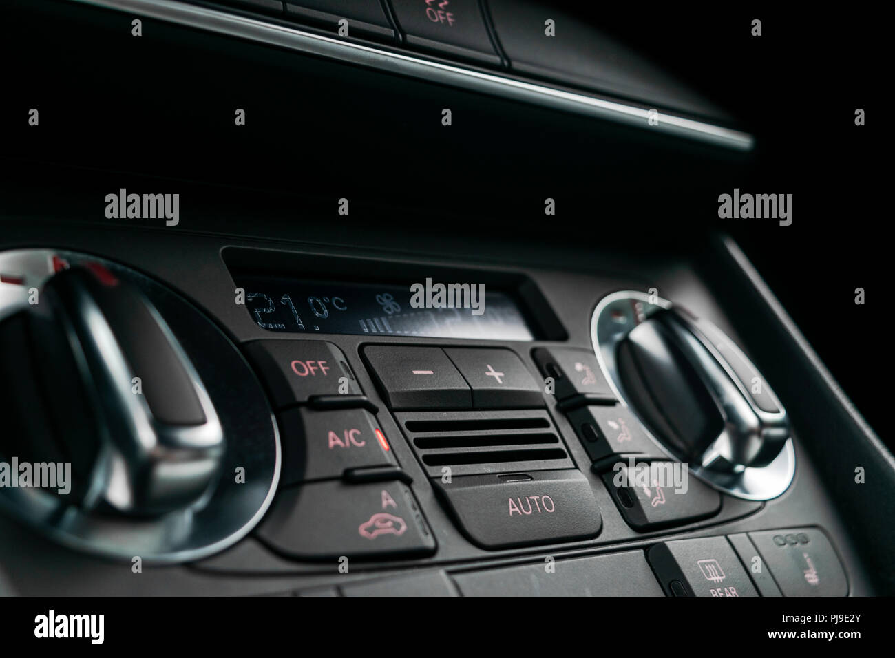 Air conditioning button inside a car. Climate control AC unit in the ...
