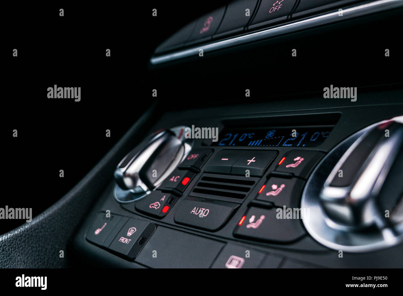 Air conditioning button inside a car. Climate control AC unit in the ...