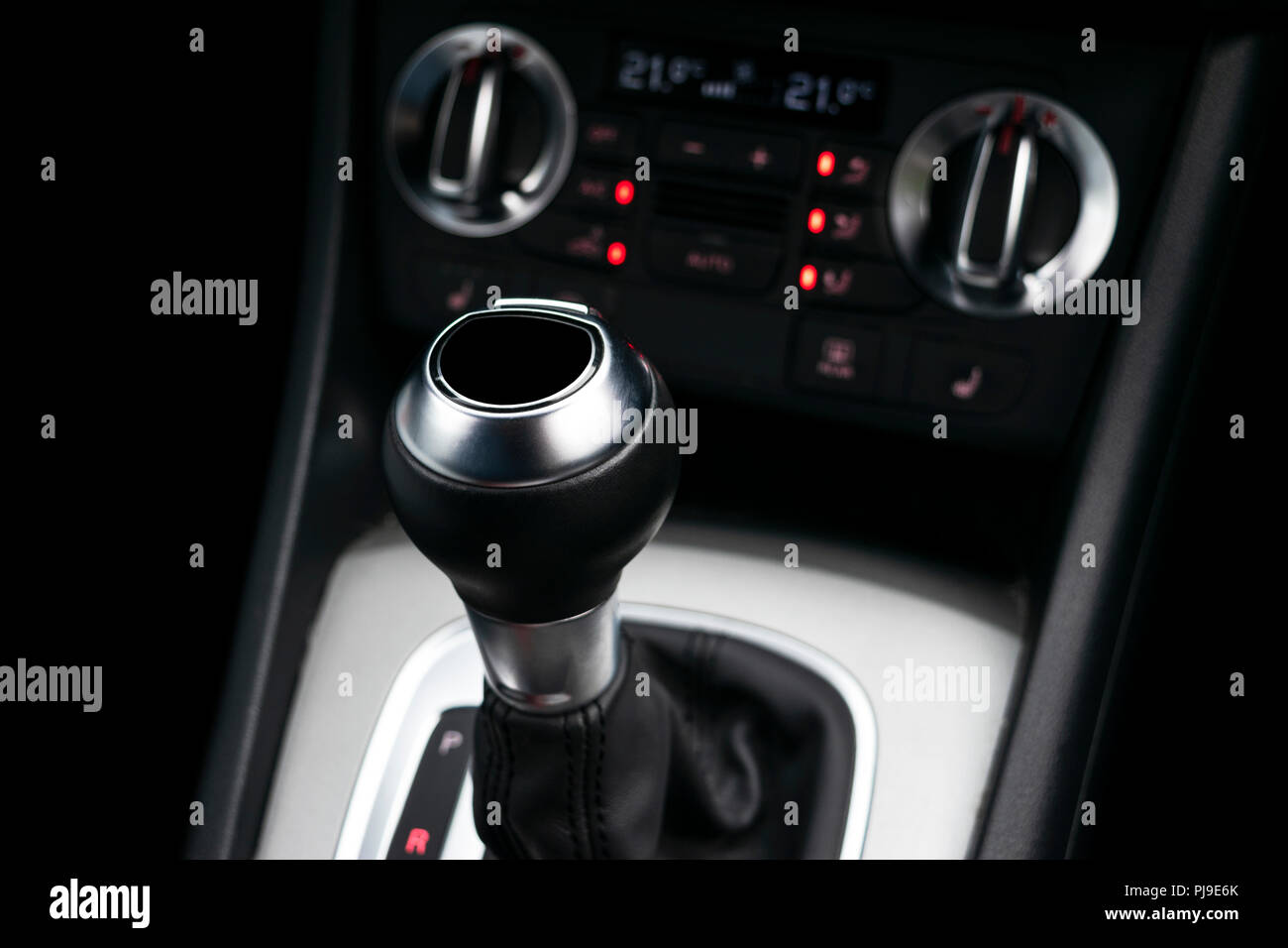 Automatic gear stick of a modern car. Modern car interior details ...