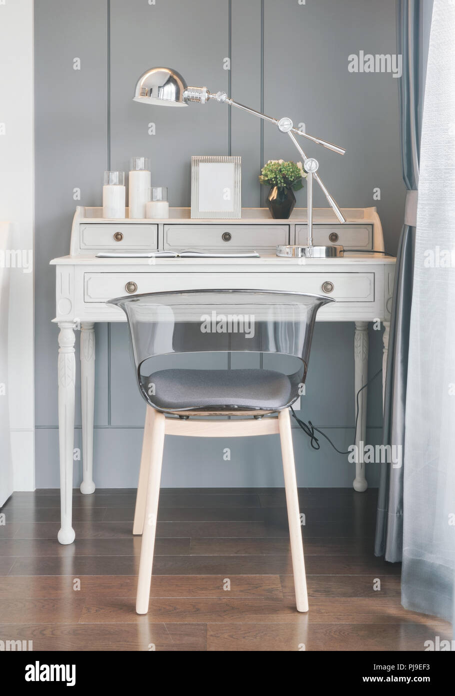 White classic style working table with table lamp chrome finished Stock ...