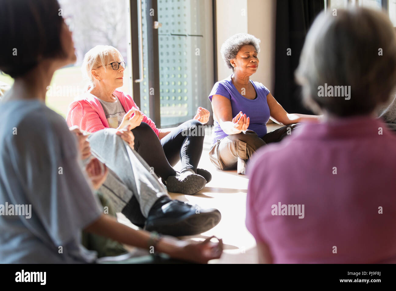 Active seniors, meditation hi-res stock photography and images - Alamy