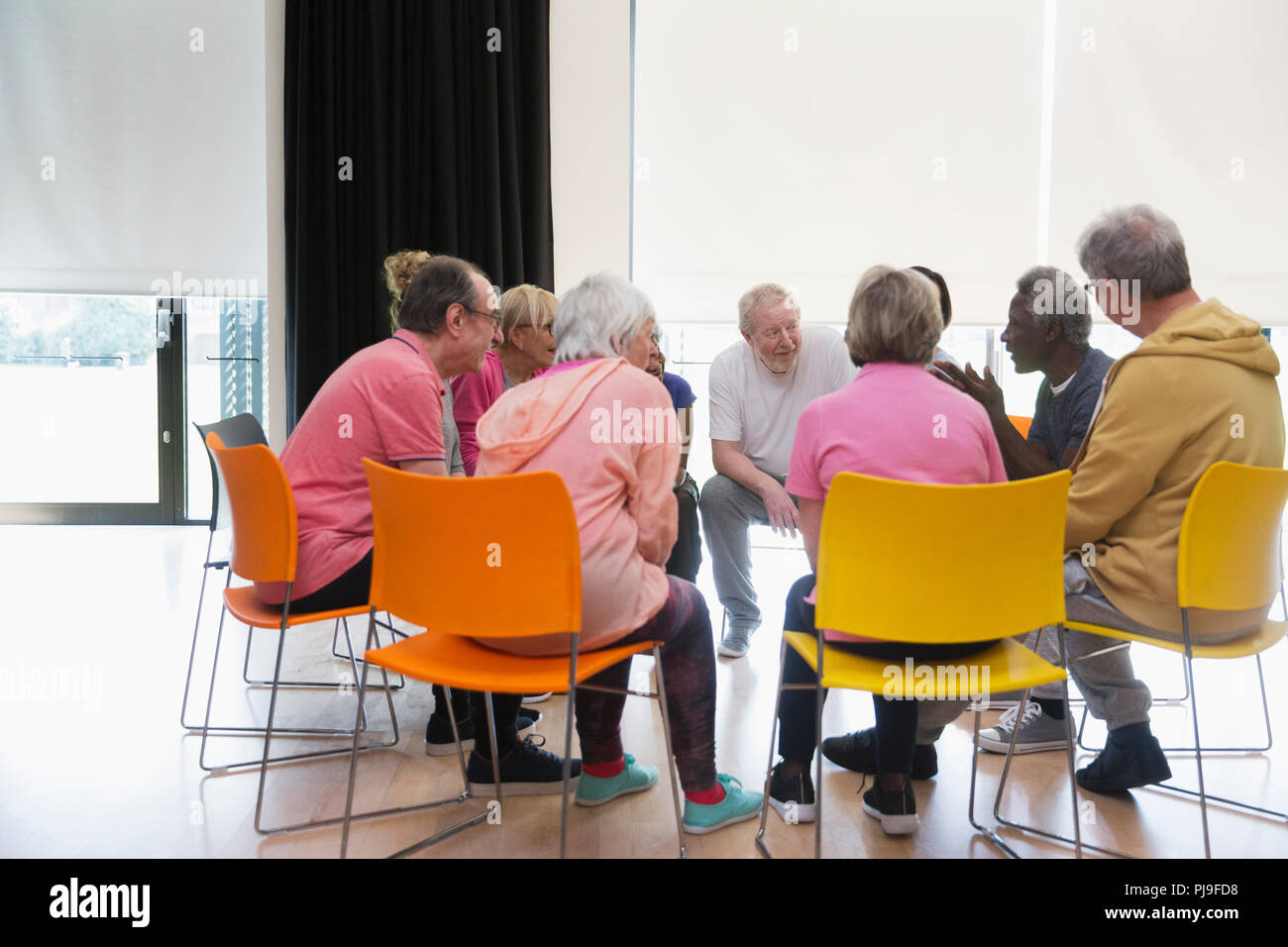Woman center circle hi-res stock photography and images - Alamy