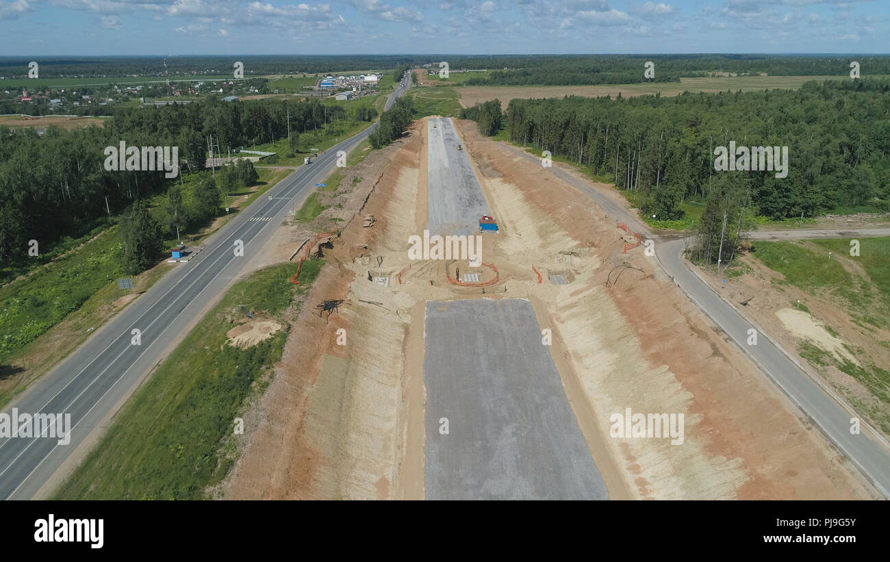 Construction of toll roads in rural areas. Aerial view construction of ...