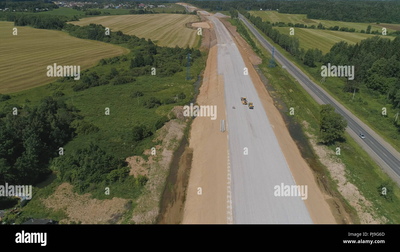 Construction of toll roads in rural areas. Aerial view construction of ...