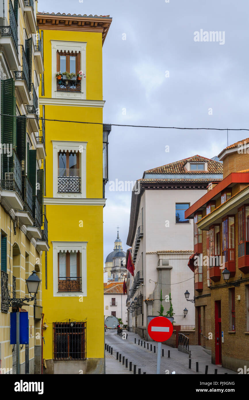 Typical street with various buildings in Madrid, Spain Stock Photo - Alamy