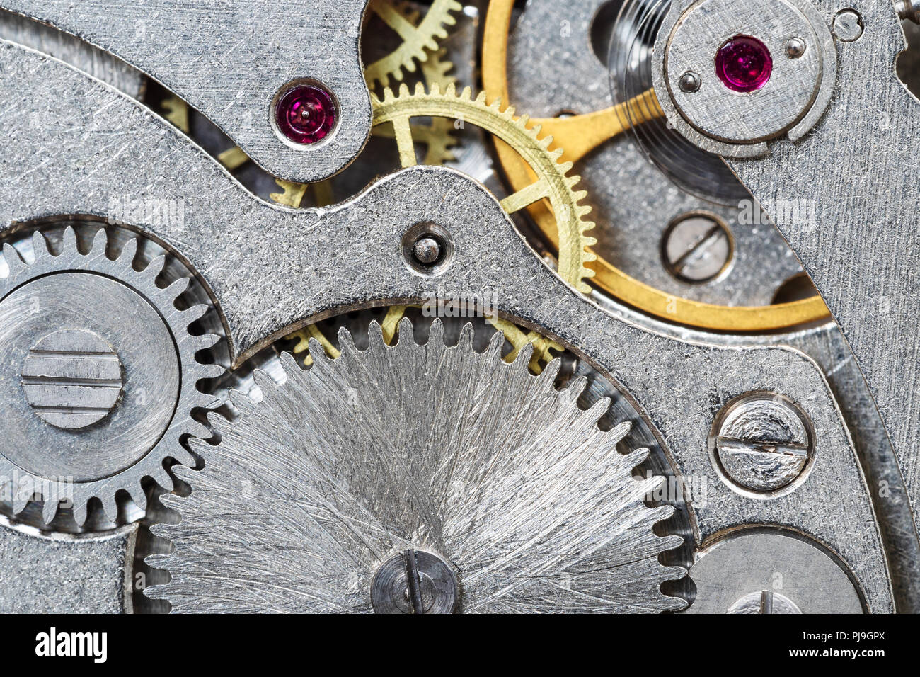 gears in retro steel mechanical watch close up Stock Photo - Alamy