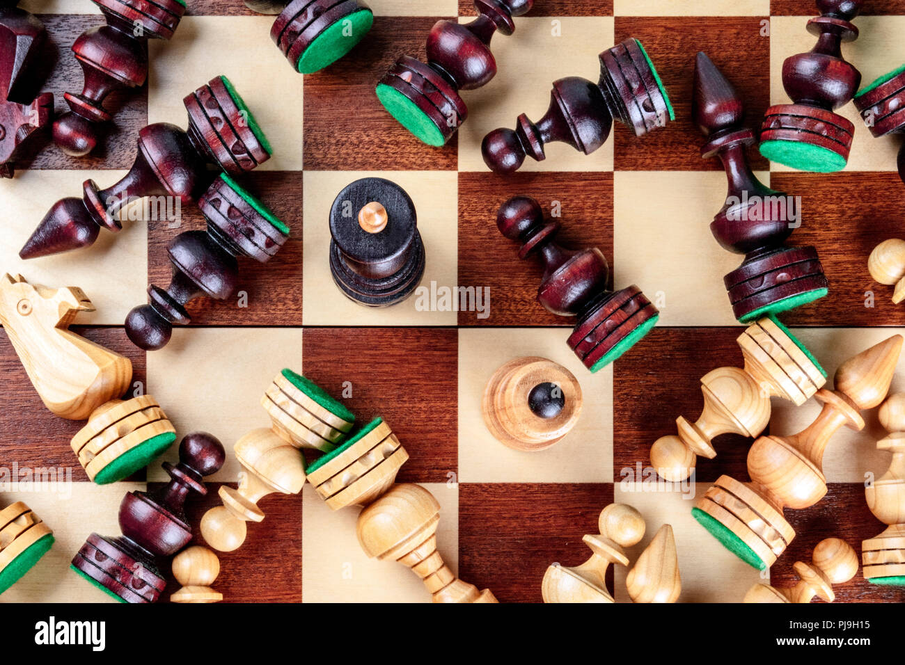 An overhead photo of a checkmate situation in chess with nearly all the ...