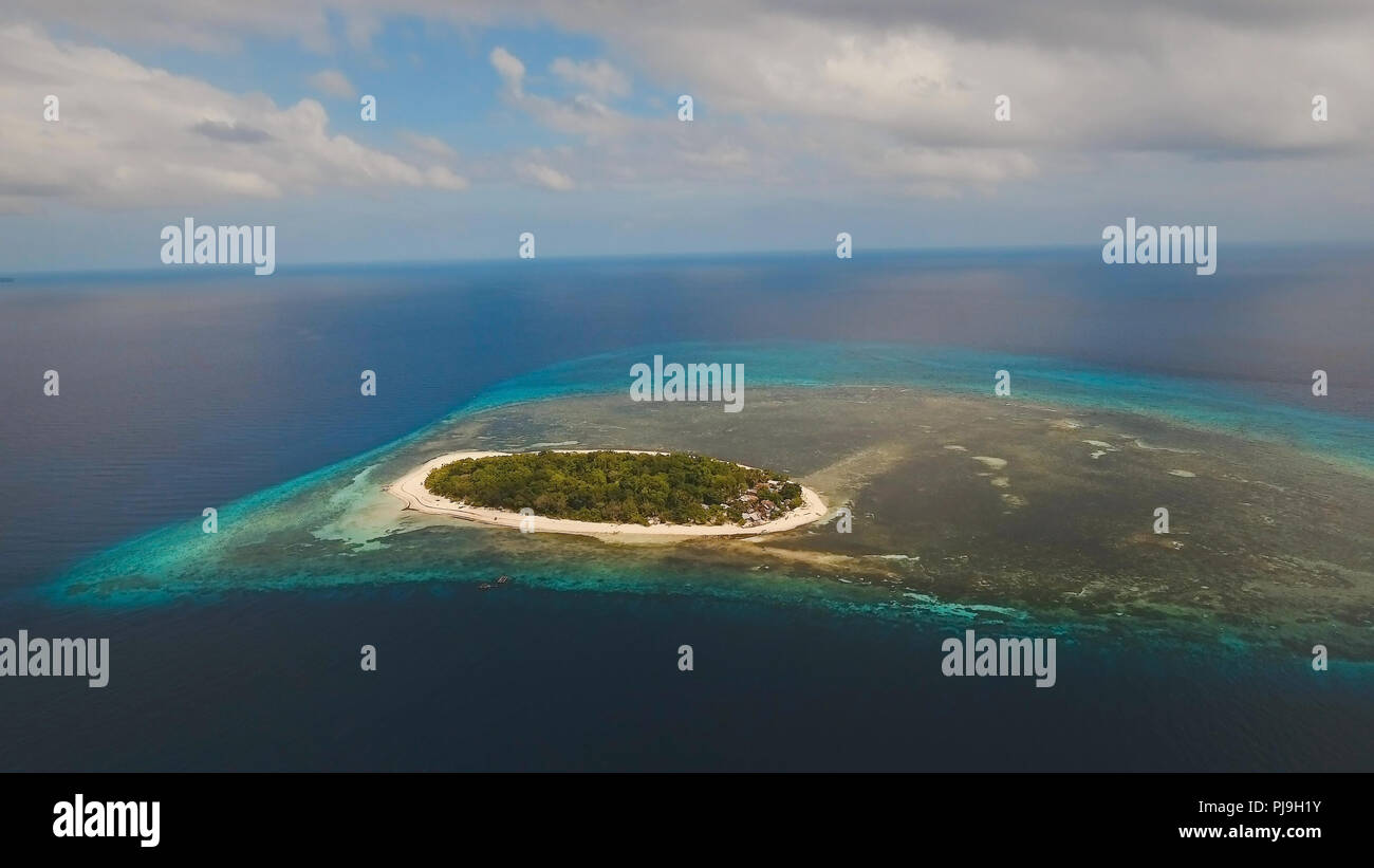 Aerial view of beautiful tropical island Mantigue with white sand beach ...