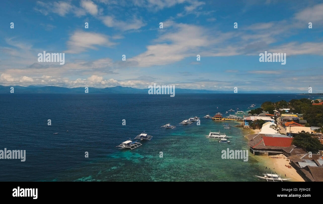 Aerial view of beautifulisland with white sand beach, Moalboal, boats ...