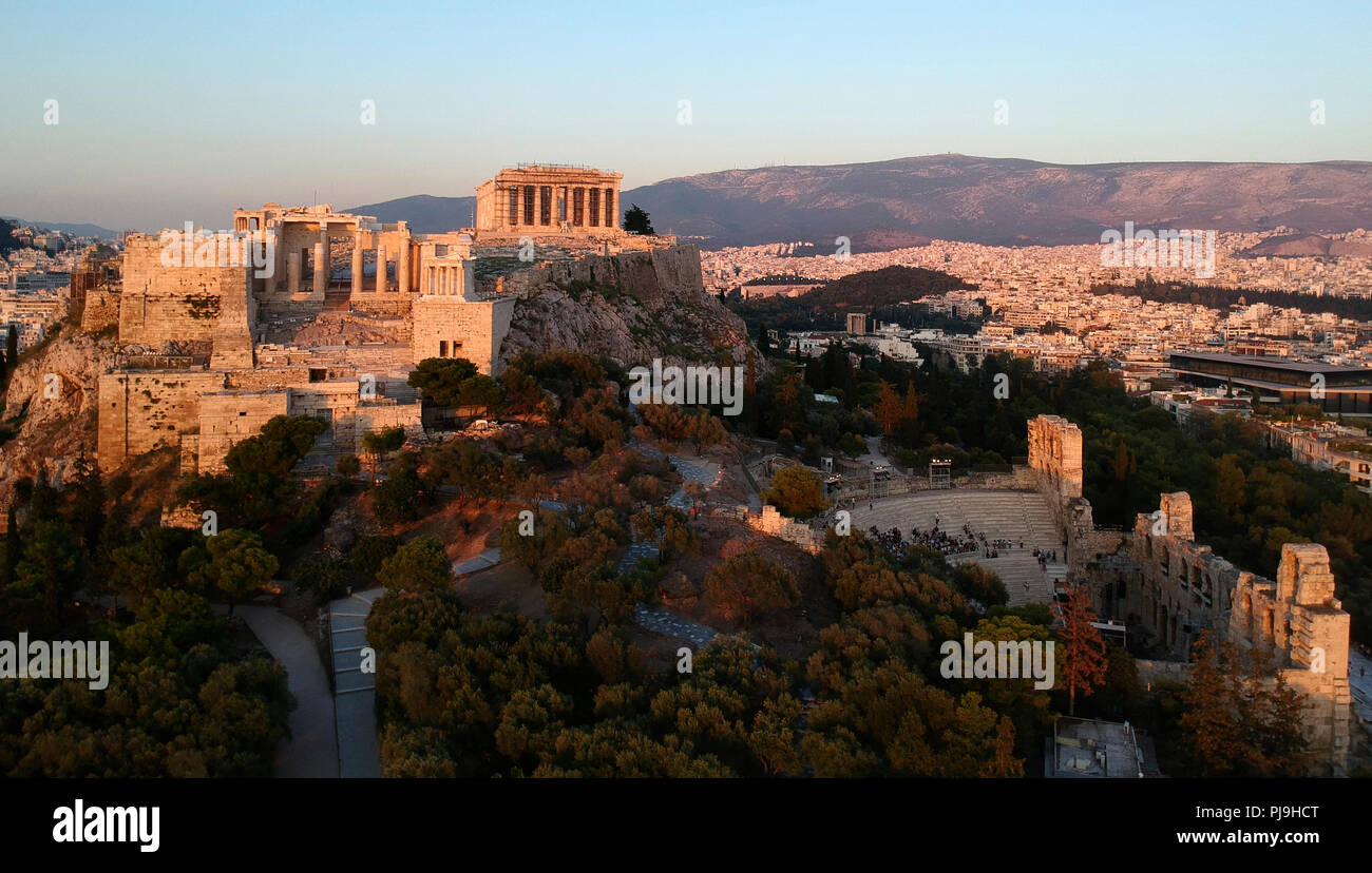 Aerial of the Acropolis, and ancient amphitheater, Odeon of Herodes ...