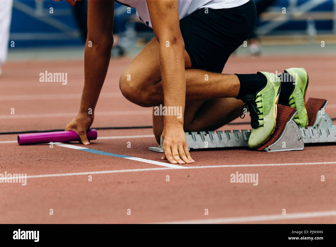 Relay sprinter starting block hi-res stock photography and images - Alamy