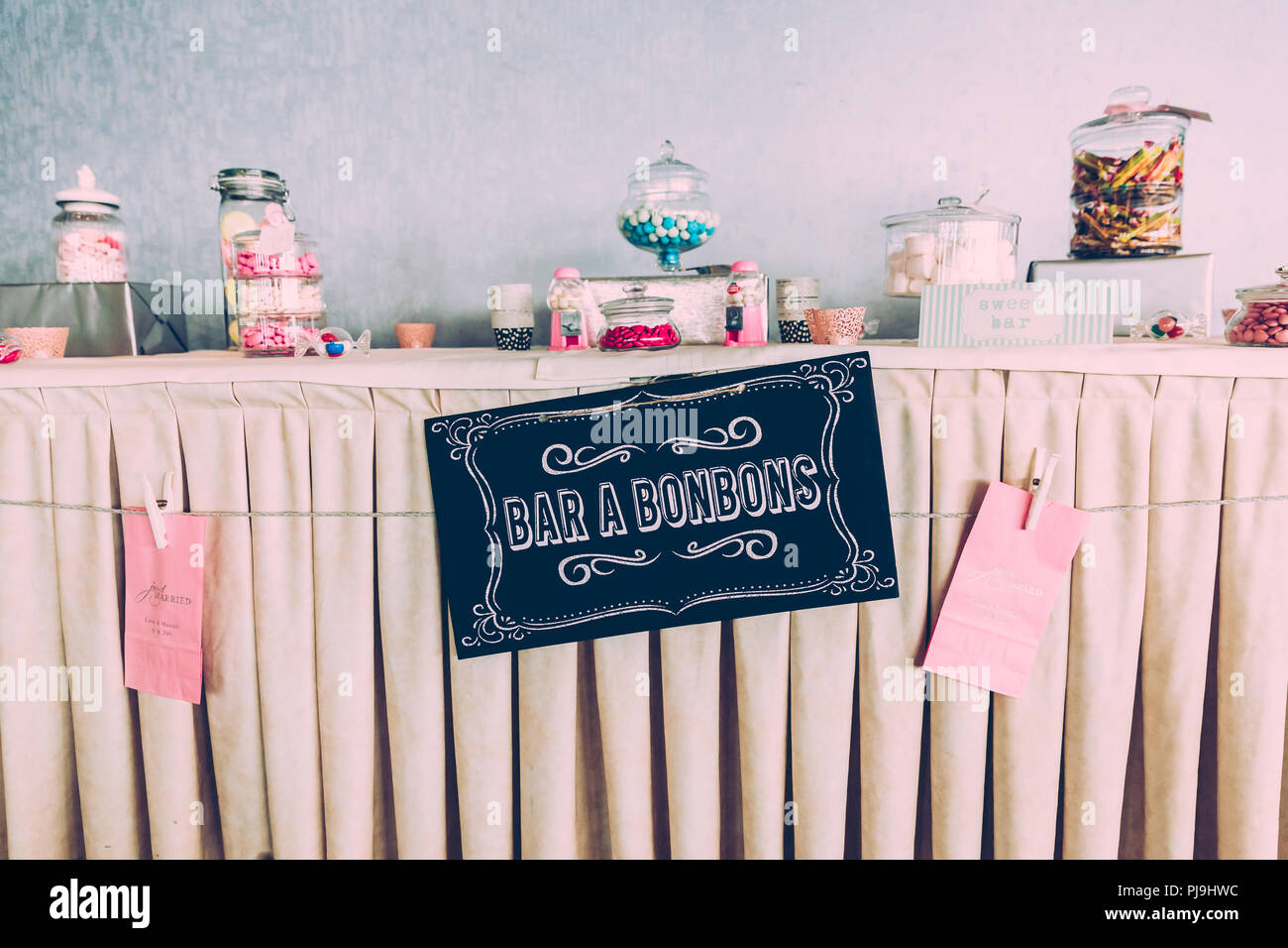 Sweet Bar Paper Sign on Wedding Table with Coloured Sweets Stock Photo ...