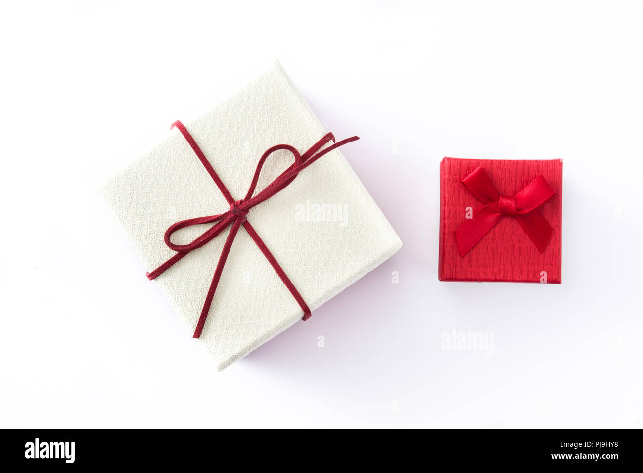White and red gift boxes isolated on white background. Top view Stock ...