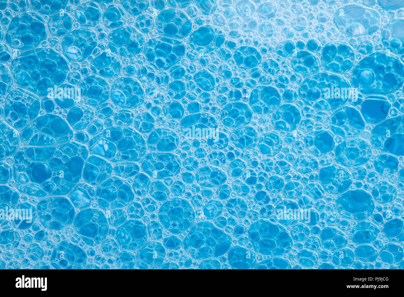abstract background texture of blue soap foam closeup Stock Photo - Alamy