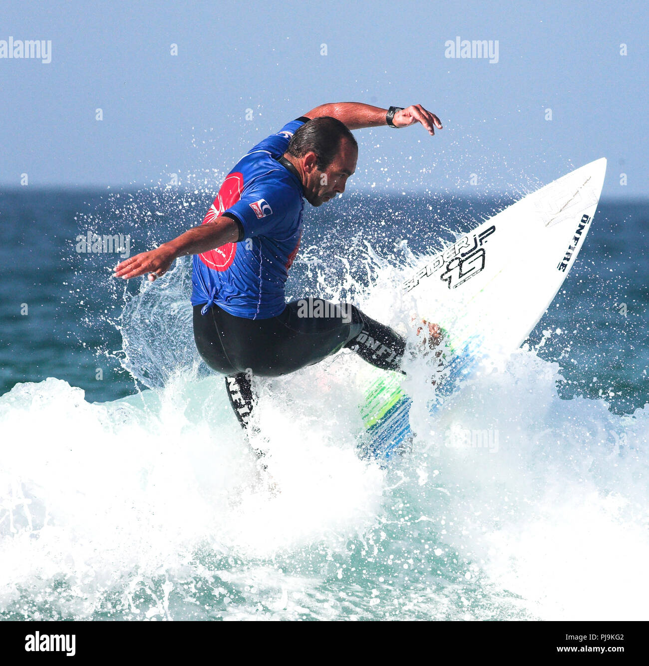 UK Pro male surfers in action sunshine Stock Photo - Alamy