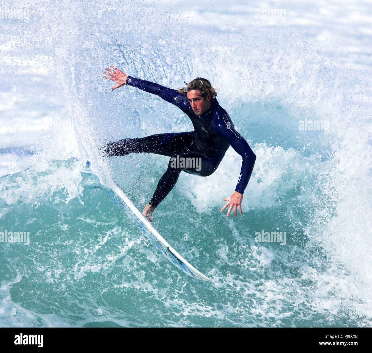 UK Pro male surfers in action sunshine Stock Photo - Alamy