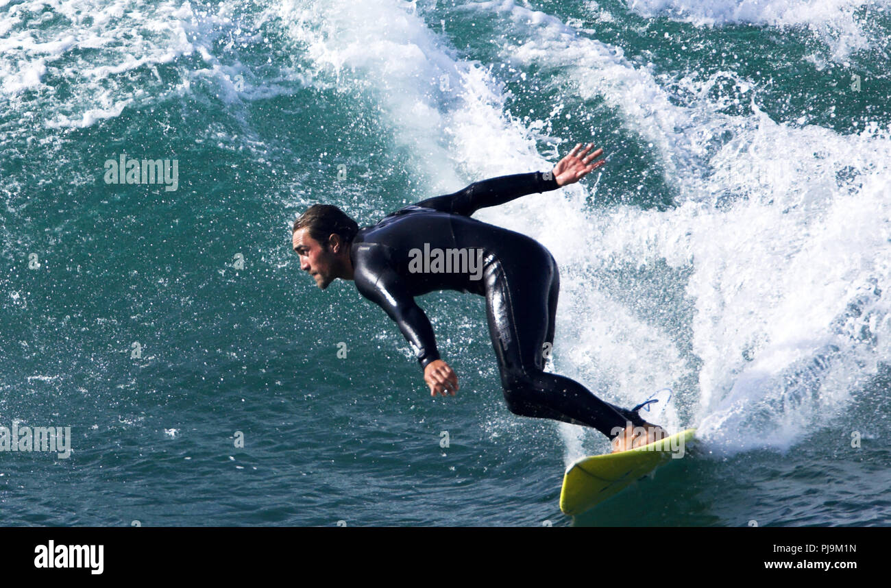 UK Pro male surfers in action sunshine Stock Photo - Alamy