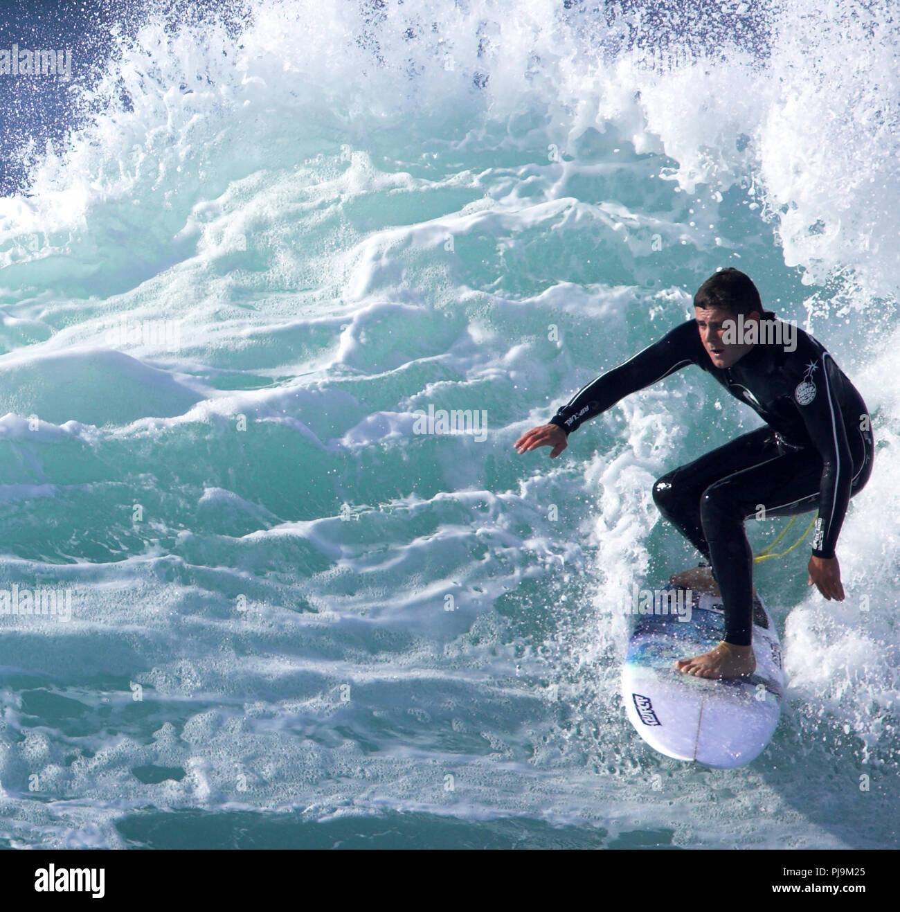 UK Pro male surfers in action sunshine Stock Photo - Alamy