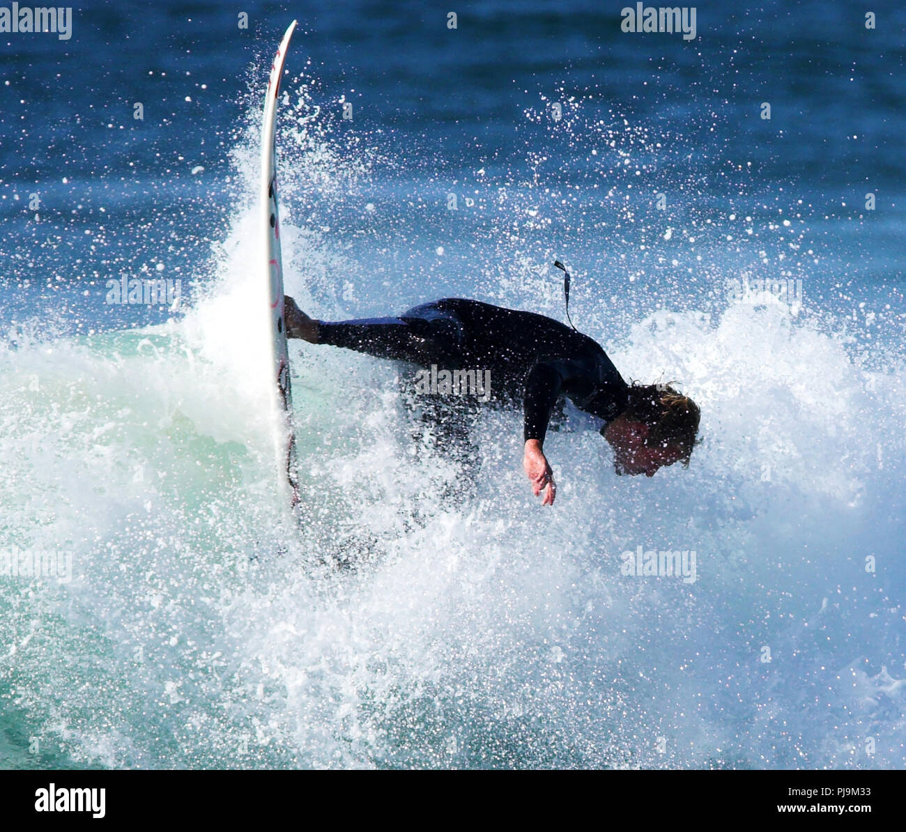 UK Pro male surfers in action sunshine Stock Photo - Alamy