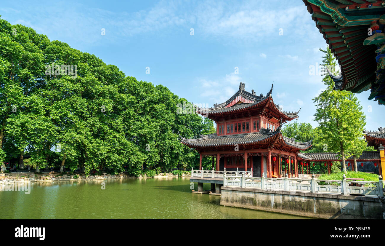 Chinese traditional classical architecture by the lake Stock Photo - Alamy