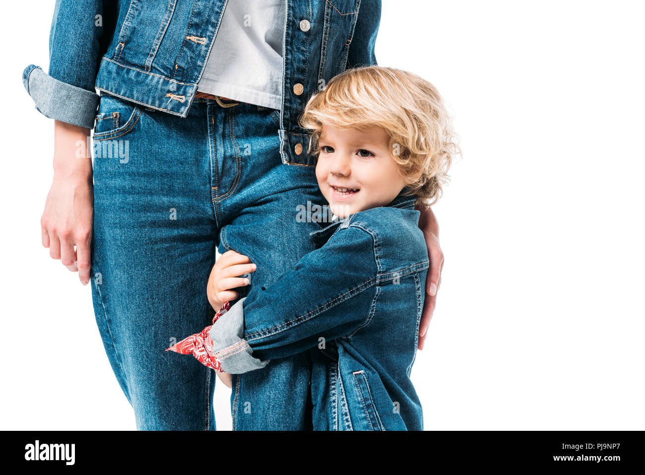 Child hugging parent leg hi-res stock photography and images - Alamy