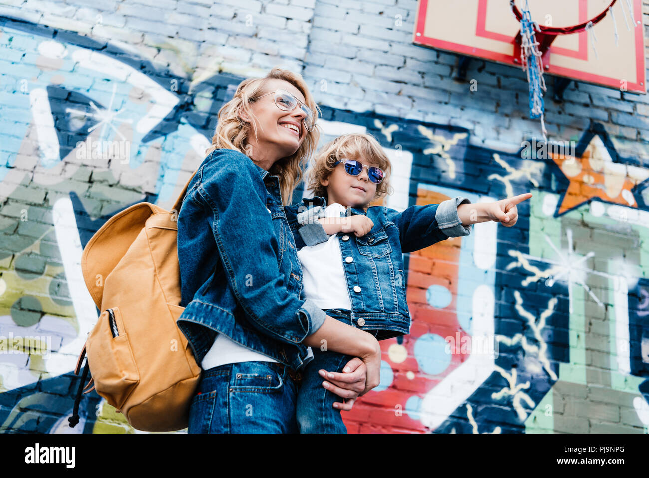 Pointing child and adult street hi-res stock photography and images - Alamy