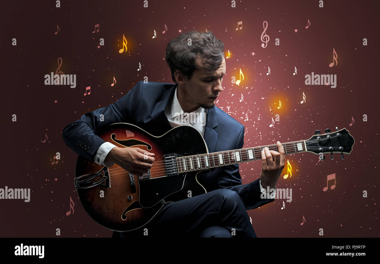 Young guitarist with falling musical notes wallpaper and classical ...