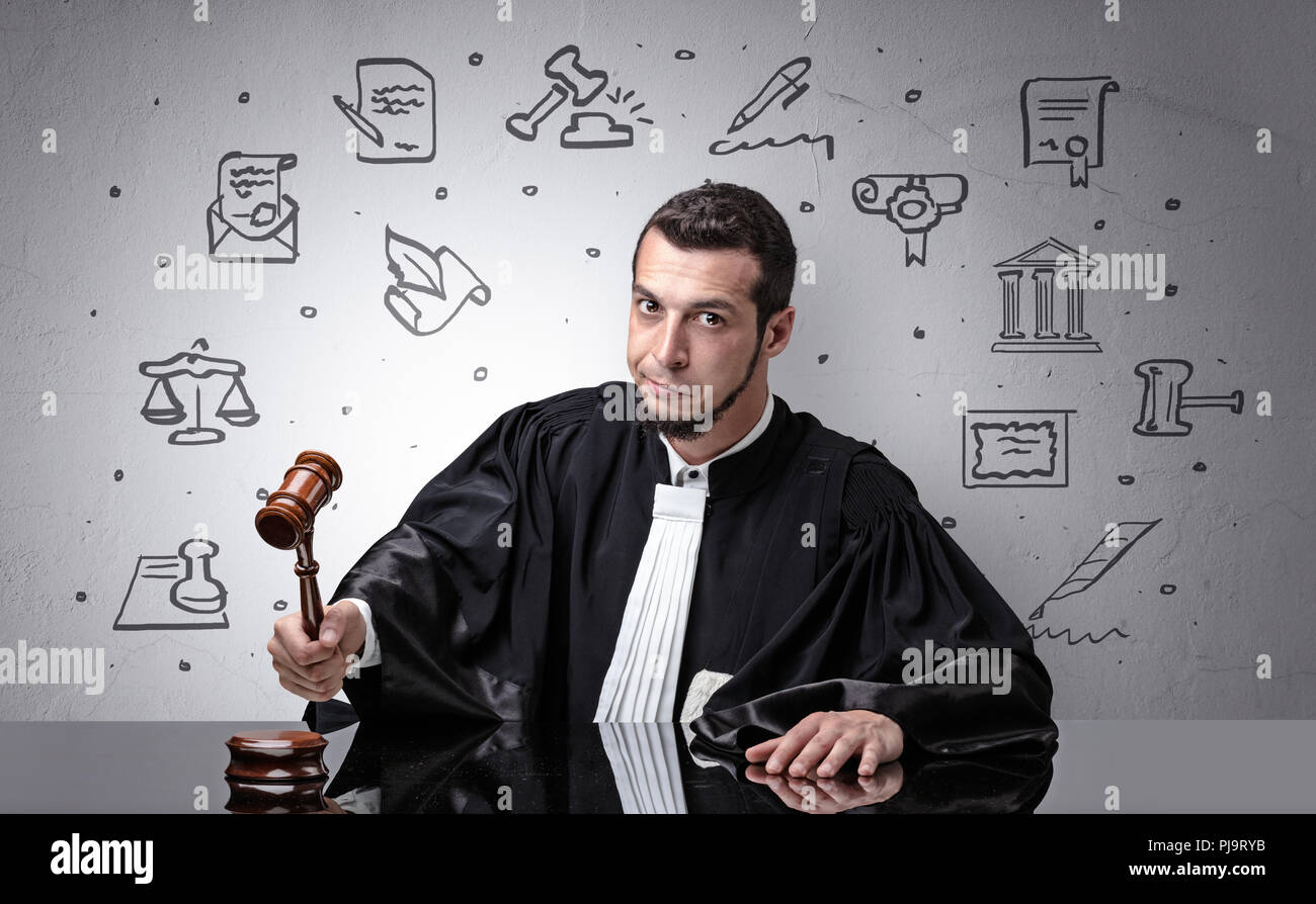 Handsome judge with court symbols around Stock Photo - Alamy