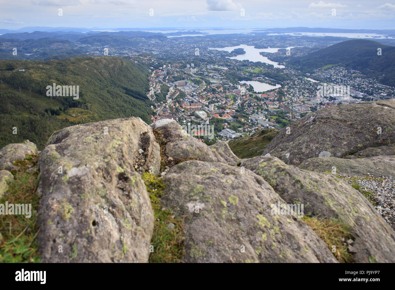 Famous view of Bergen from Mount Ulriken. Skyline, clouds, fjords ...