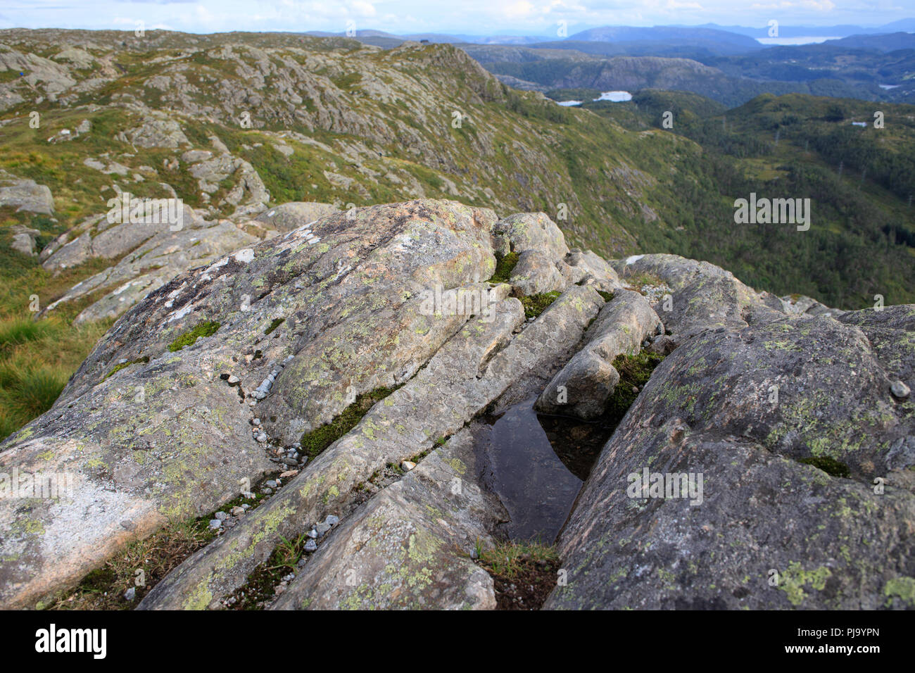 Famous view from Mount Ulriken, Bergen. Skyline, clouds, fjords ...
