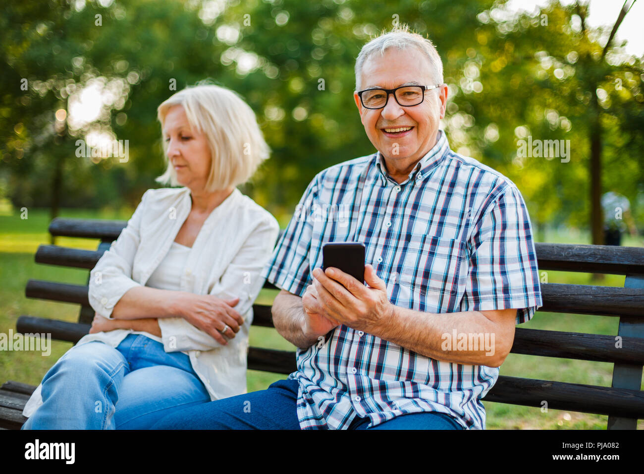 Senior woman phone angry hi-res stock photography and images - Alamy