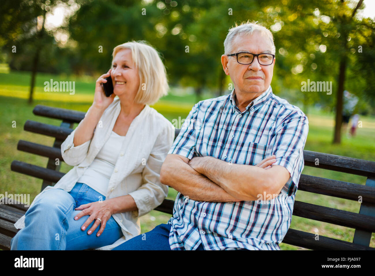 Senior woman phone angry hi-res stock photography and images - Alamy