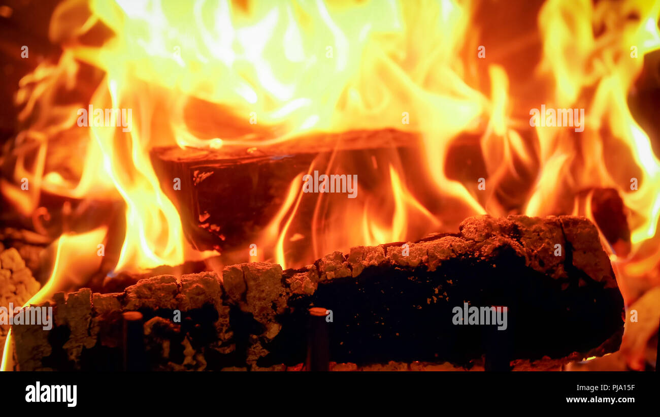 Closeup image of fire flames in fireplace Stock Photo - Alamy