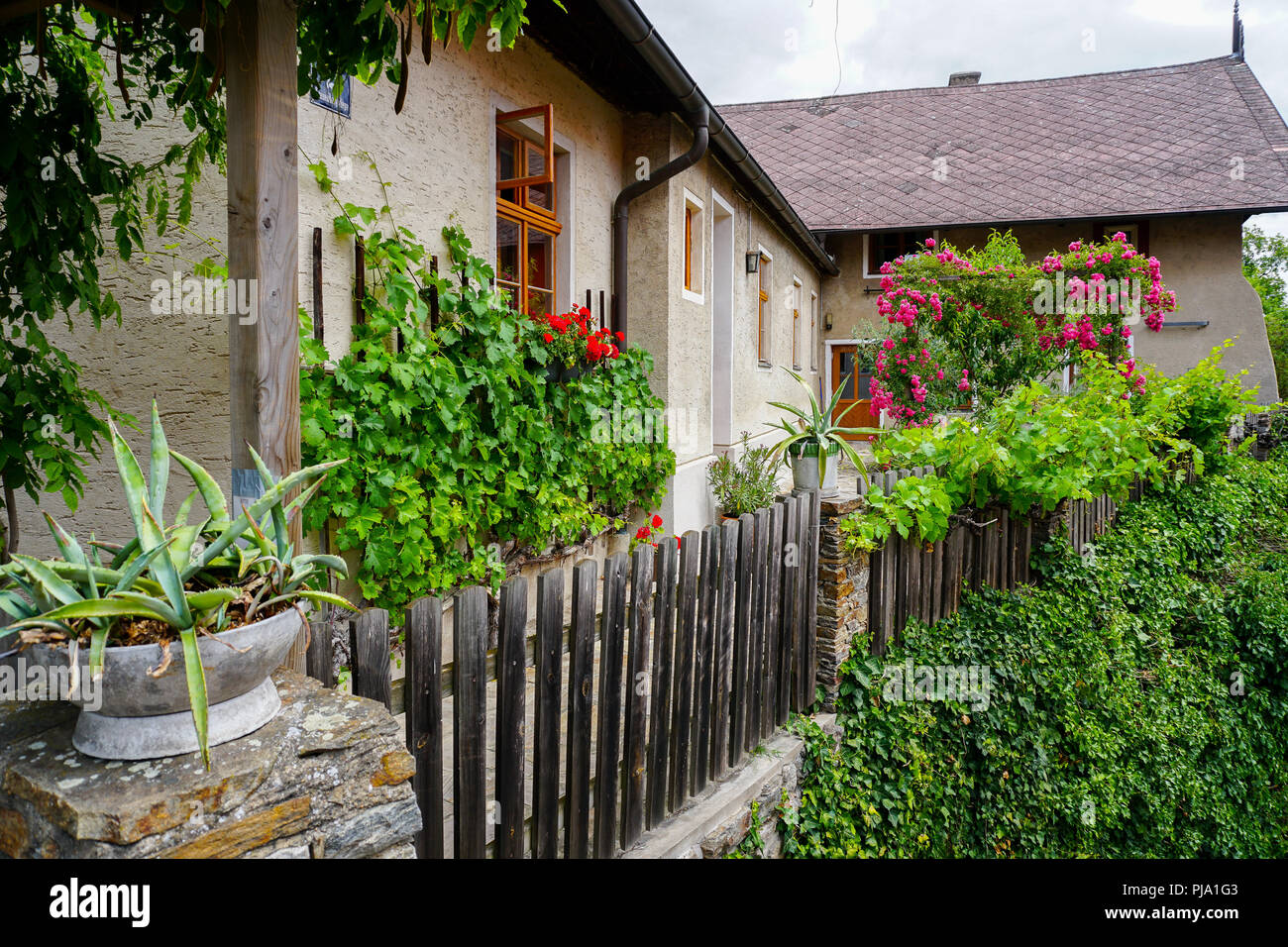 Austrian little rural buildings decorated with plants Stock Photo - Alamy