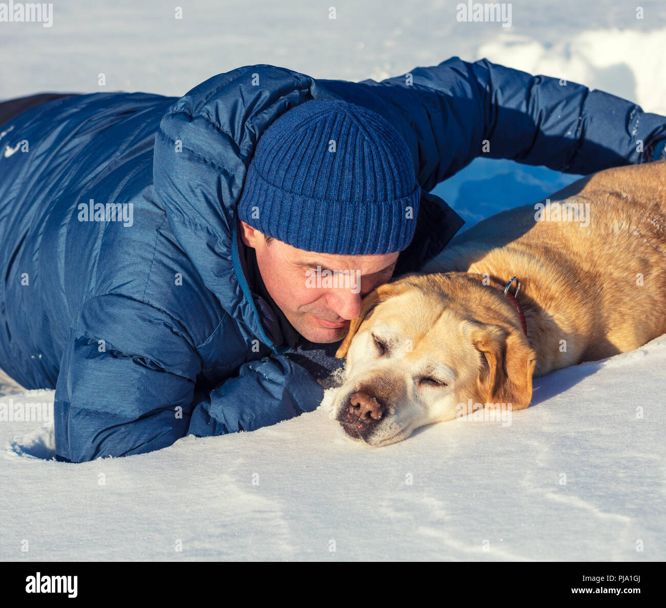 Sad man in snow hi-res stock photography and images - Alamy