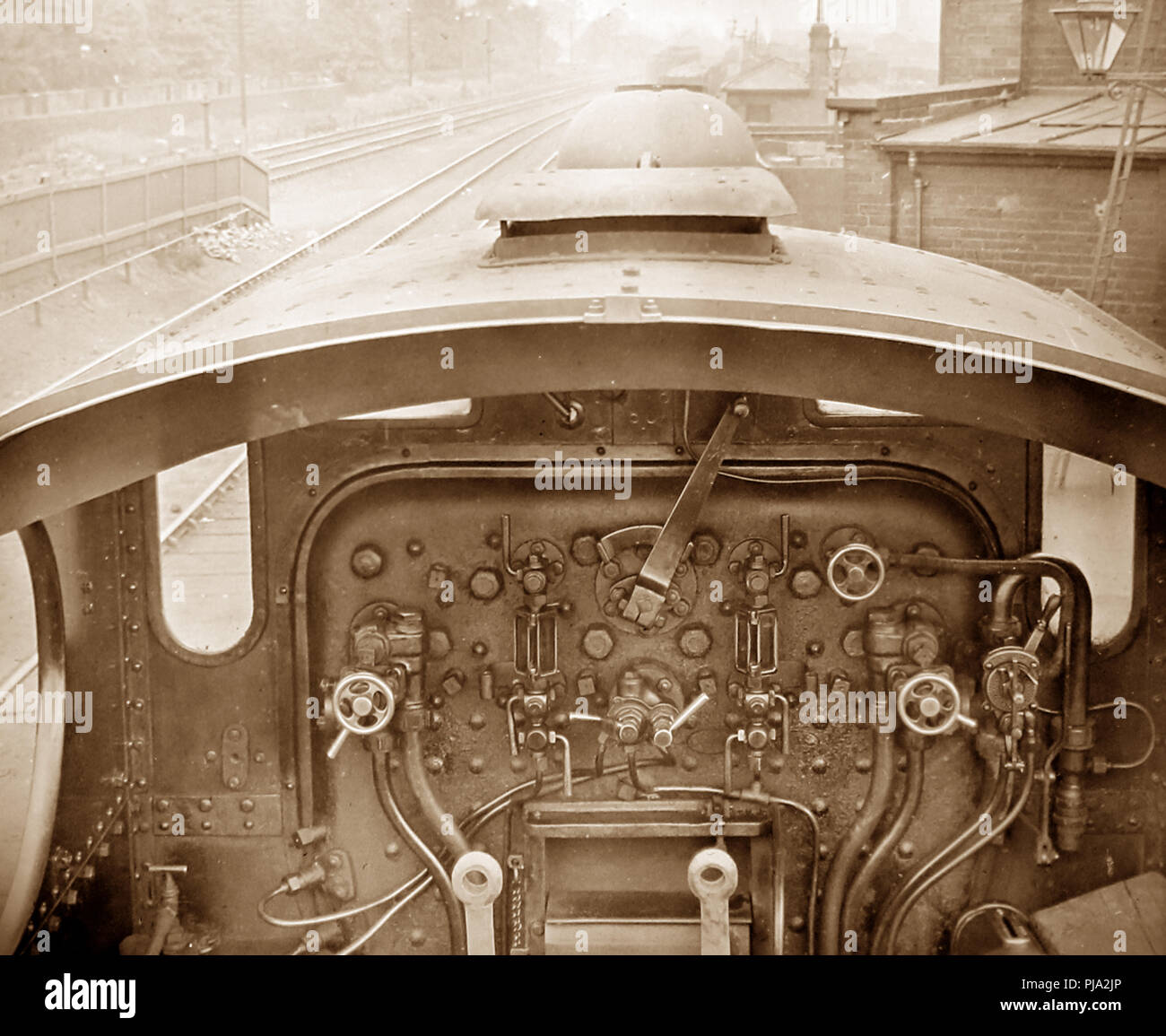 Steam engine cab, early 1900s Stock Photo - Alamy