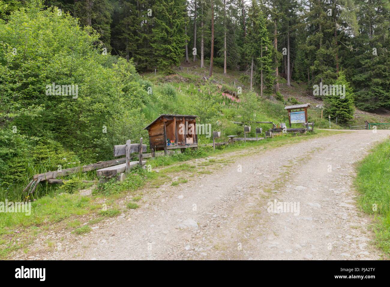 Water games on a themed hiking trail, Austria Stock Photo - Alamy