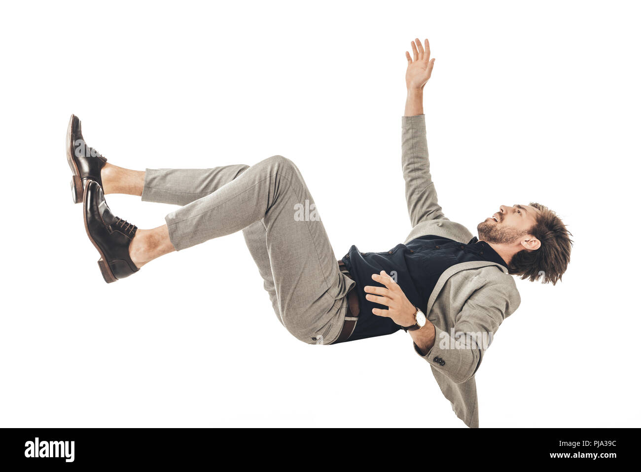 Man in suit falling hi-res stock photography and images - Alamy