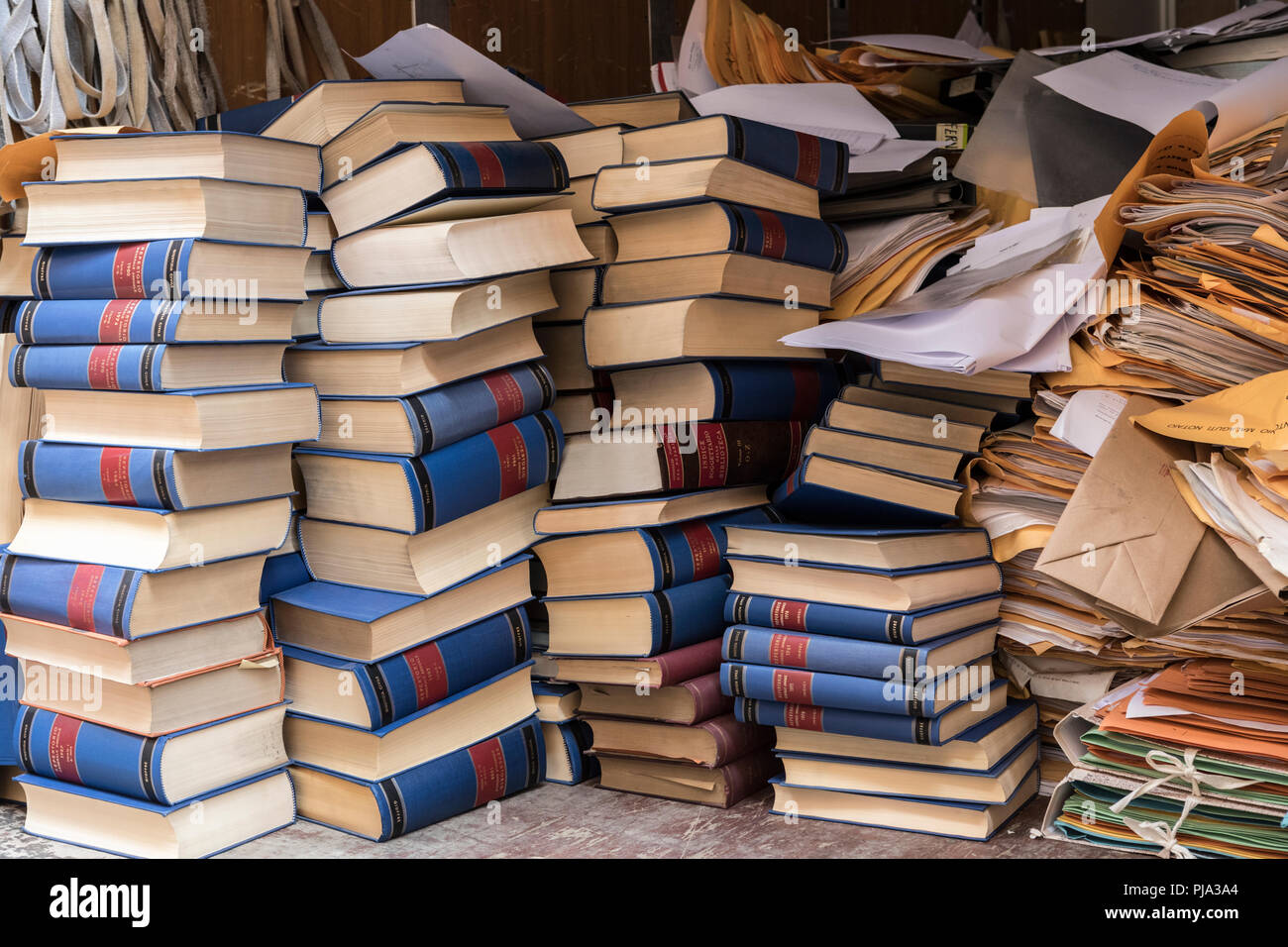 Piles of books Stock Photo - Alamy